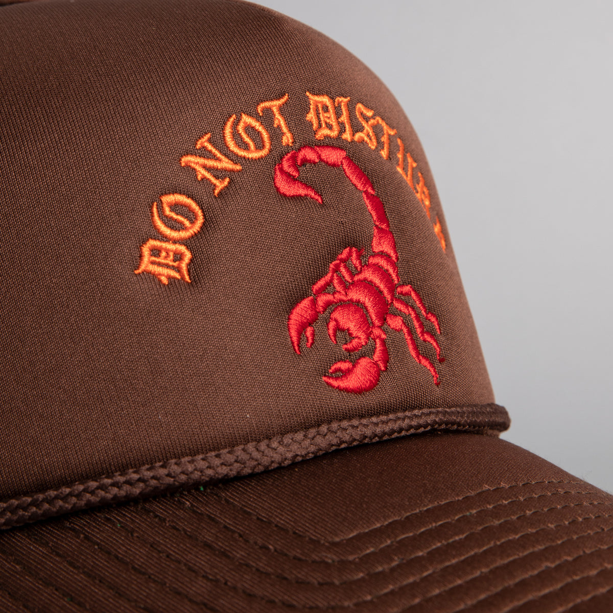DO NOT DISTURB MOCHA TRUCKER HAT
